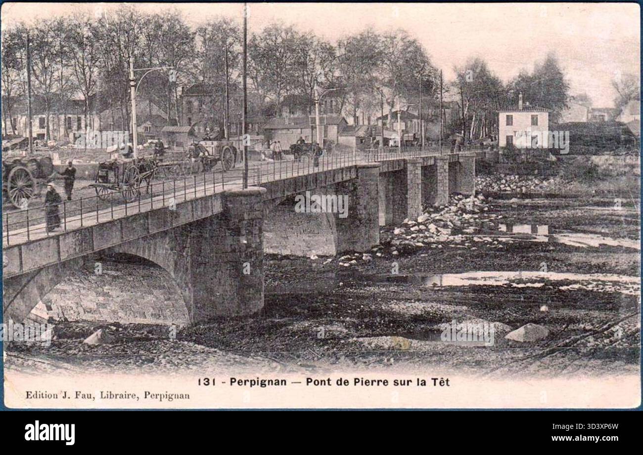 This photograph showcases the Pont de Pierre over the Têt River in ...