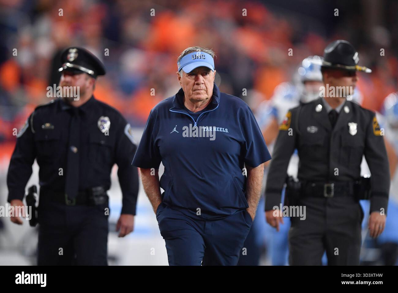 North Carolina head coach Bill Belichick walks on the field before an ...