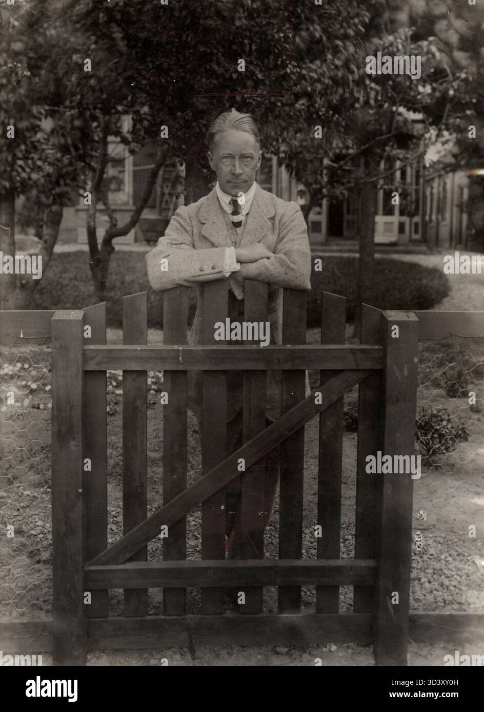 Ex-Crown Prince Wilhelm III of Germany poses leaning on a fence in ...