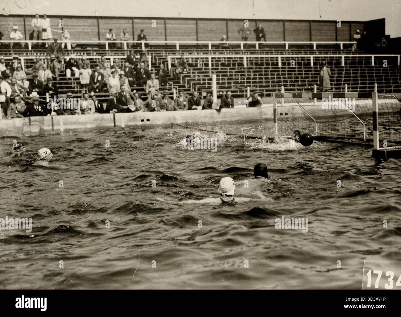 Water polo match during the 1928 Amsterdam Olympics. The image is a low ...