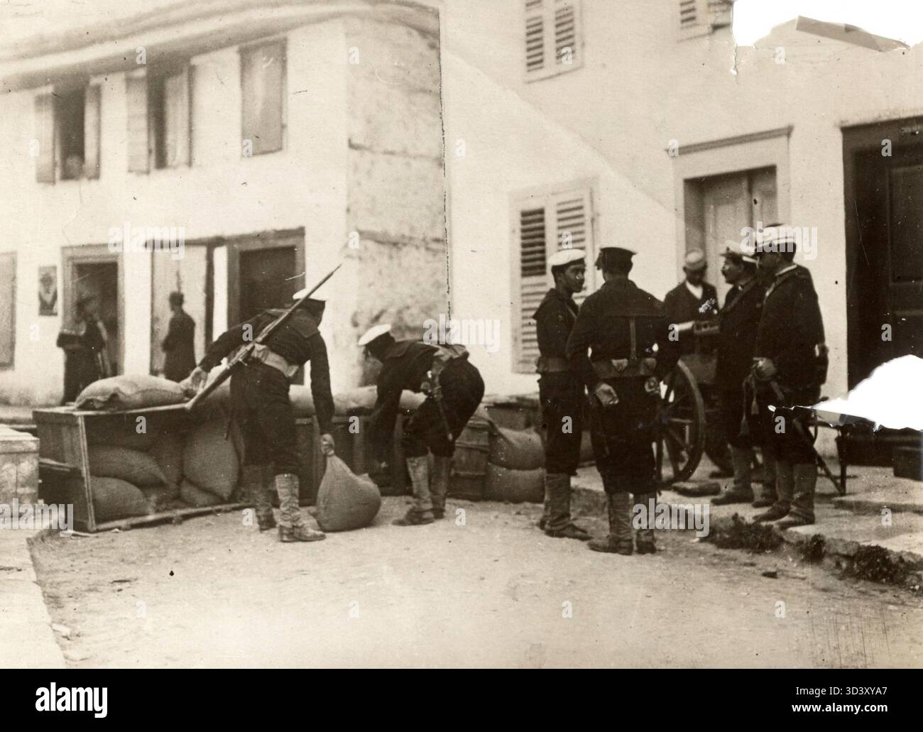 Italian naval soldiers build barricades to defend the city of Durazzo ...