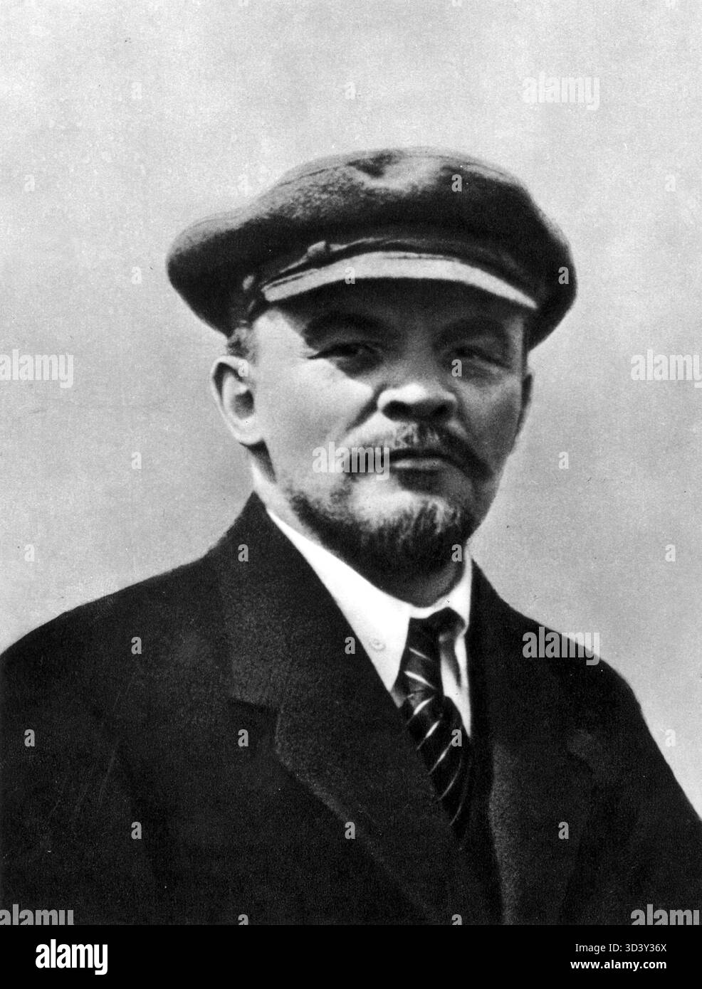 This 1920 portrait of Lenin shows him wearing a hat. The image captures ...