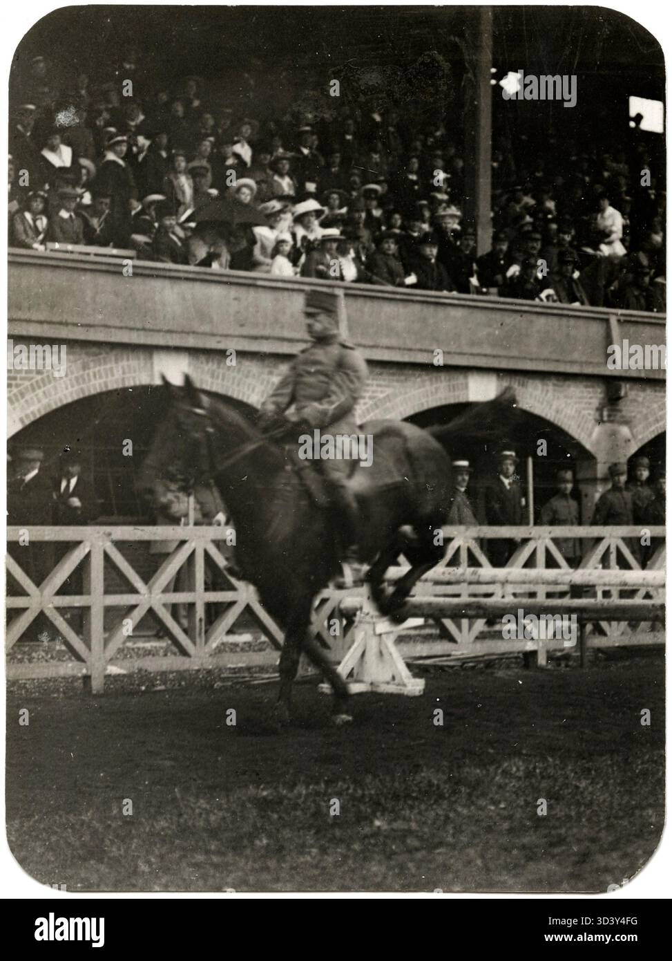 On National Army Day, a soldier on horseback rides past the covered ...