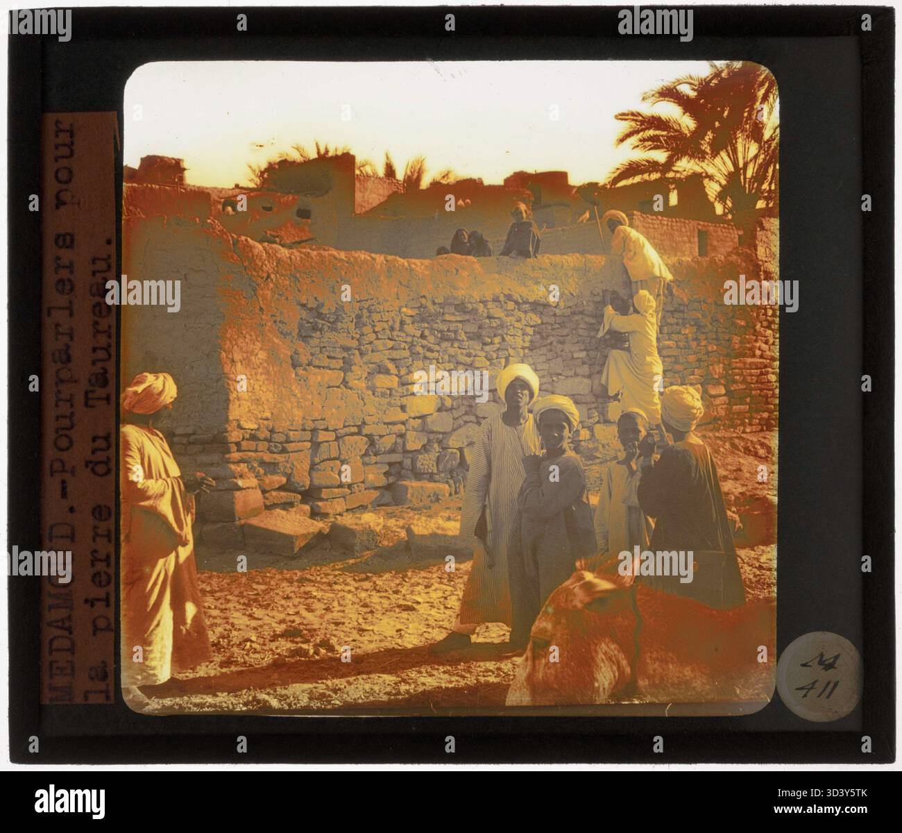 A glass diapositive from circa 1924-1932 shows workers standing in ...