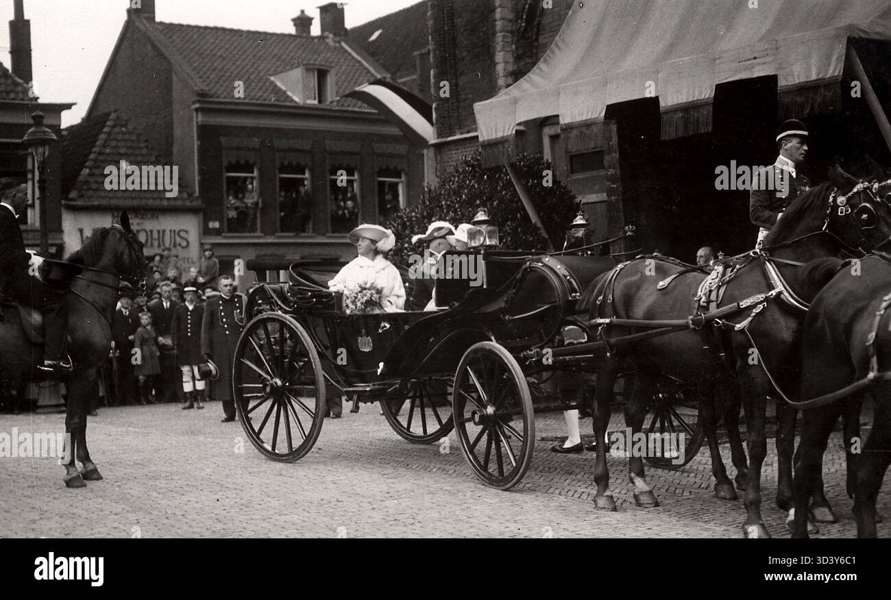 In 1923, Queen Wilhelmina of the Netherlands takes a carriage ride ...