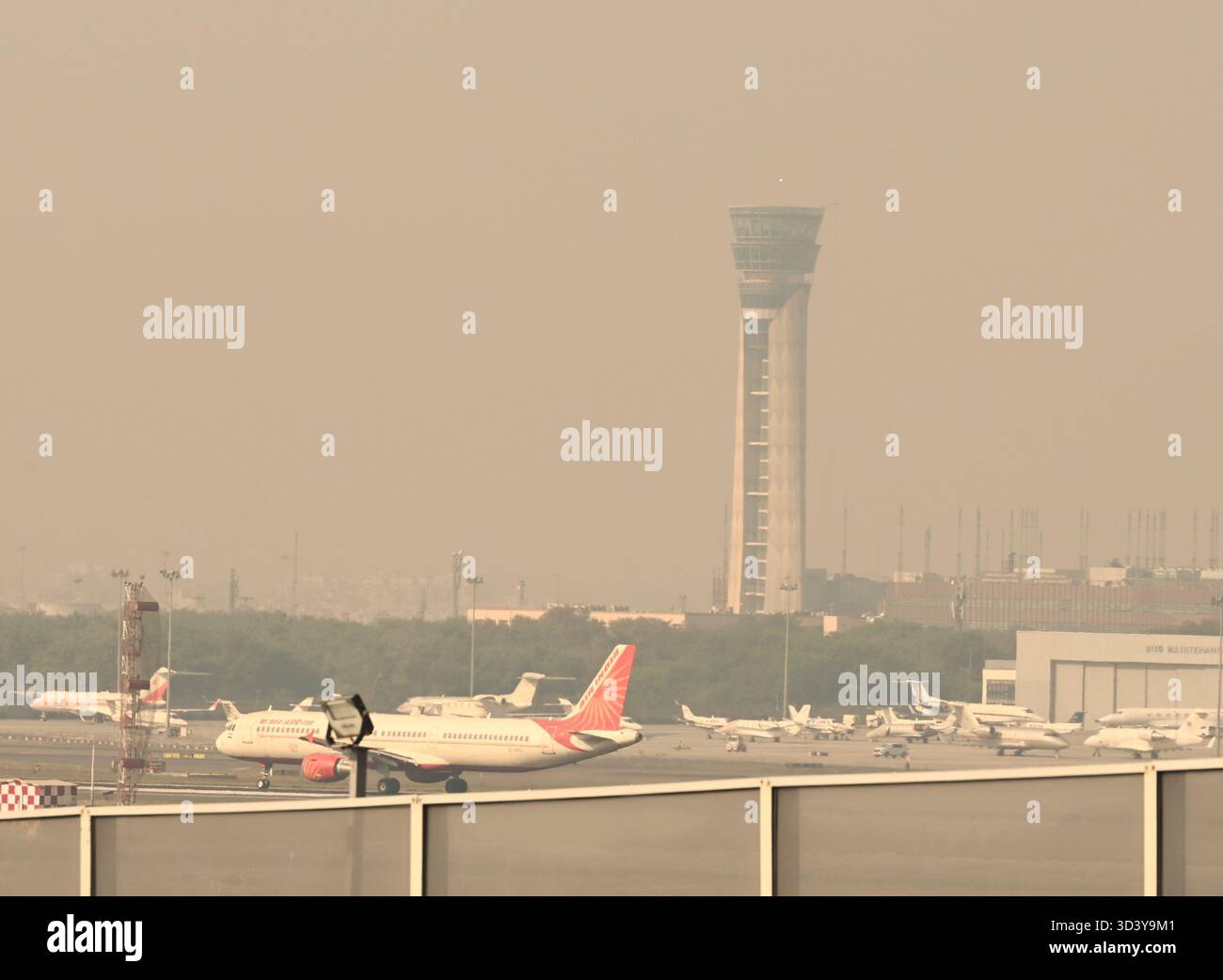 NEW DELHI, INDIA - NOVEMBER 7: ATC Tower at IGI seen engulf in thick ...