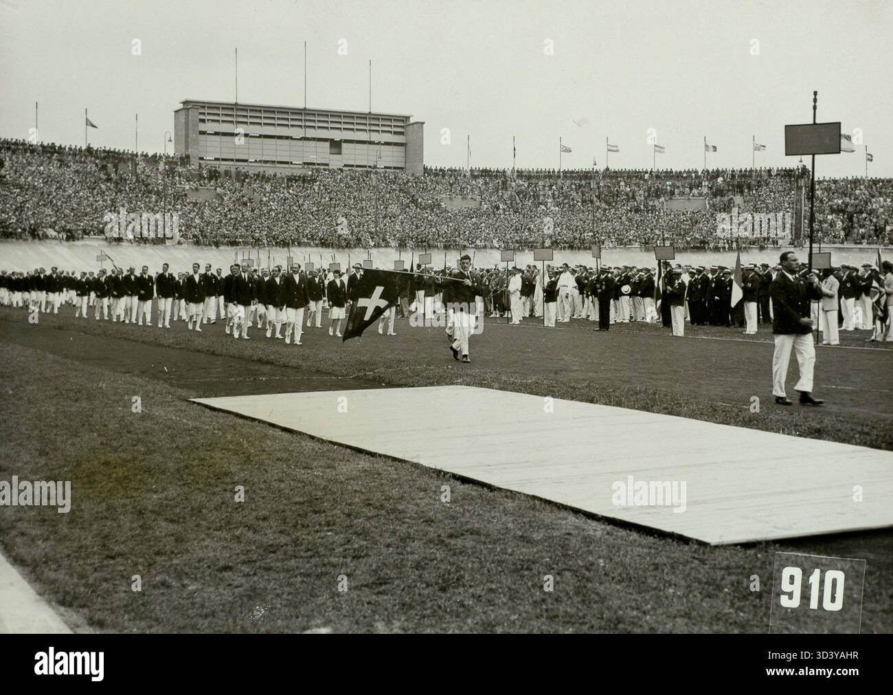 The Swiss Olympic team enters the Olympic Stadium in Amsterdam during ...