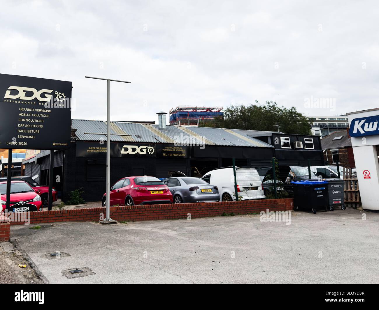 Manchester, UK - September 30, 2025: Cars parked outside a Manchester ...