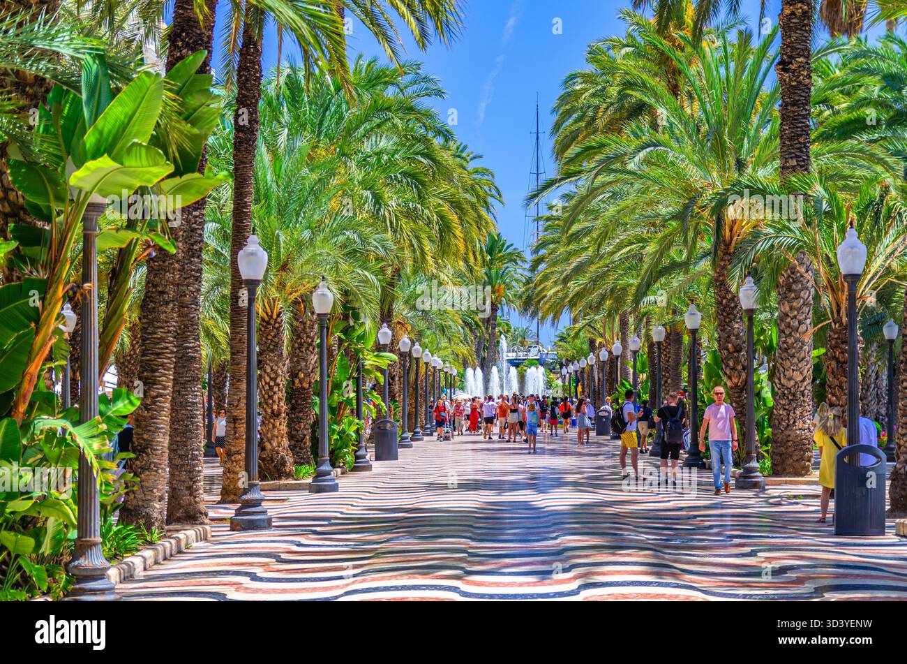 Alicante, Spain, June 1, 2025: people walking down tourists stroll ...