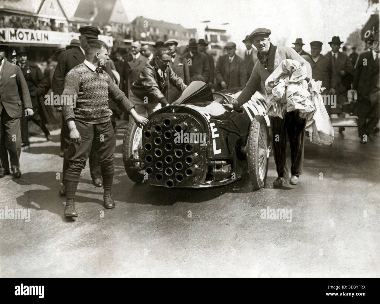 Fritz von Opel’s Rocket Car 1 is being driven to the starting line of ...