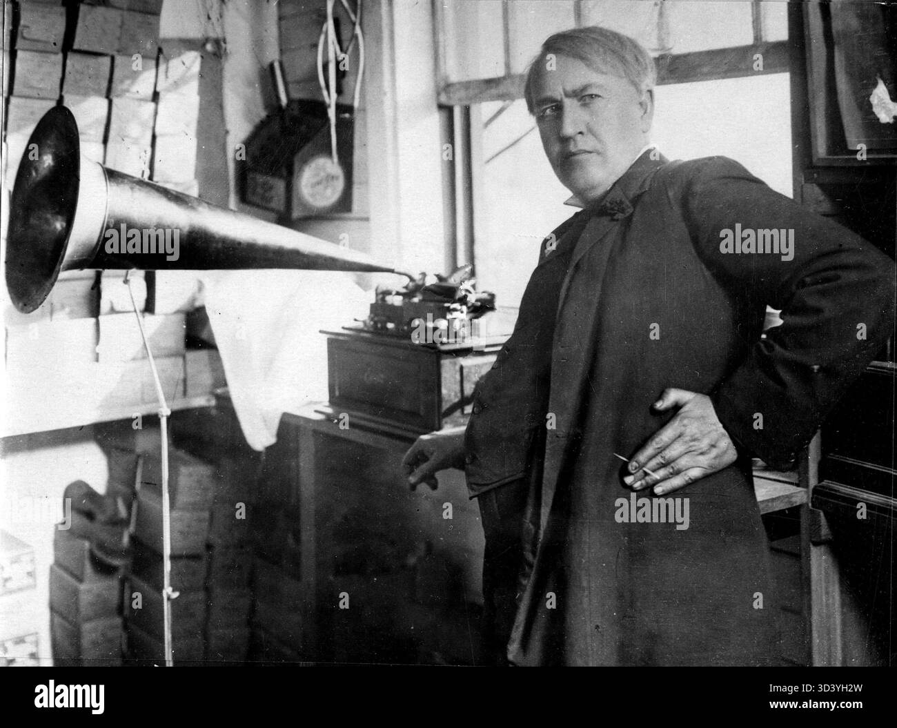 Thomas Alva Edison is shown with his 1878 invention, the first ...