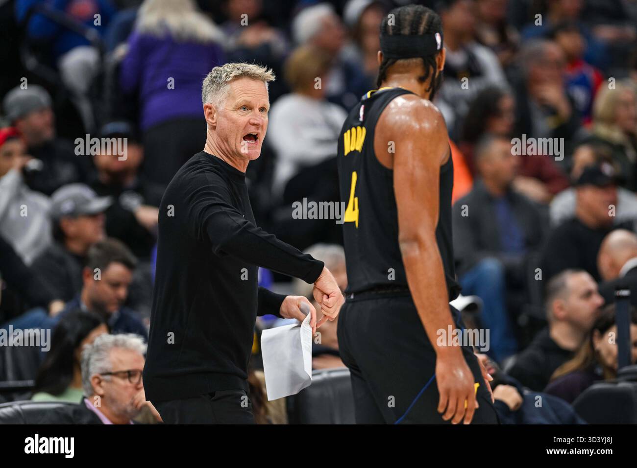 Golden State Warriors head coach Steve Kerr talks to Moses Moody (4 ...