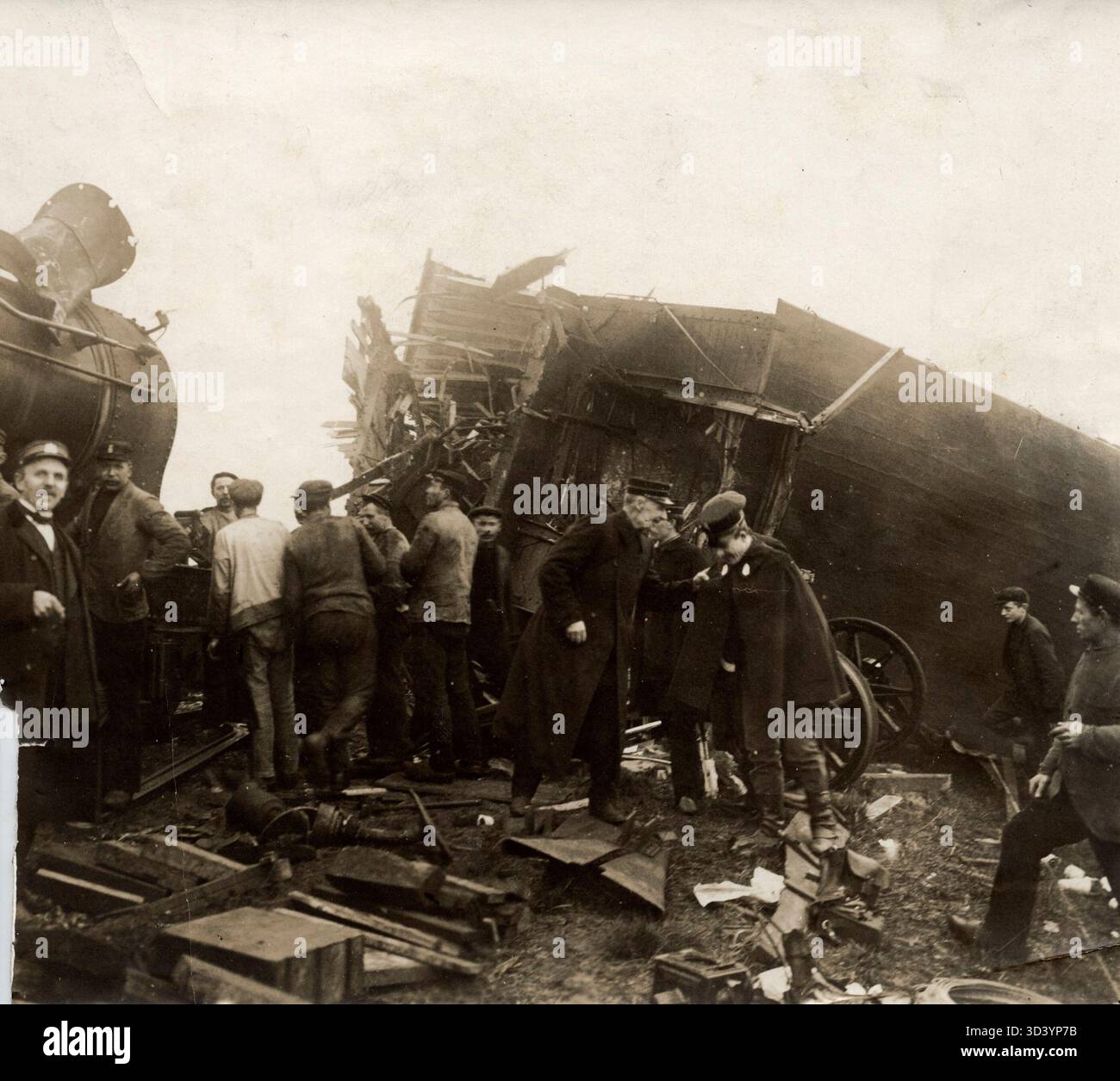 A large crowd observes the aftermath of the collision between the ...