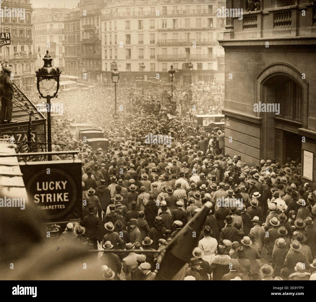 A crowd gathers at a station in Paris in 1927 to welcome the crew of ...