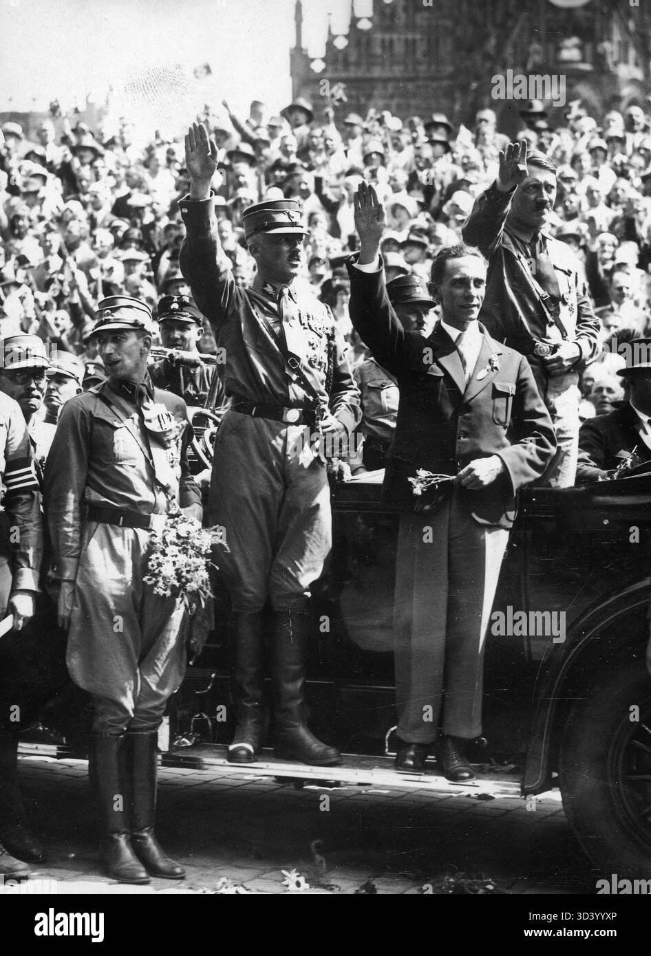 Adolf hitler parades with swastika flags Black and White Stock Photos ...