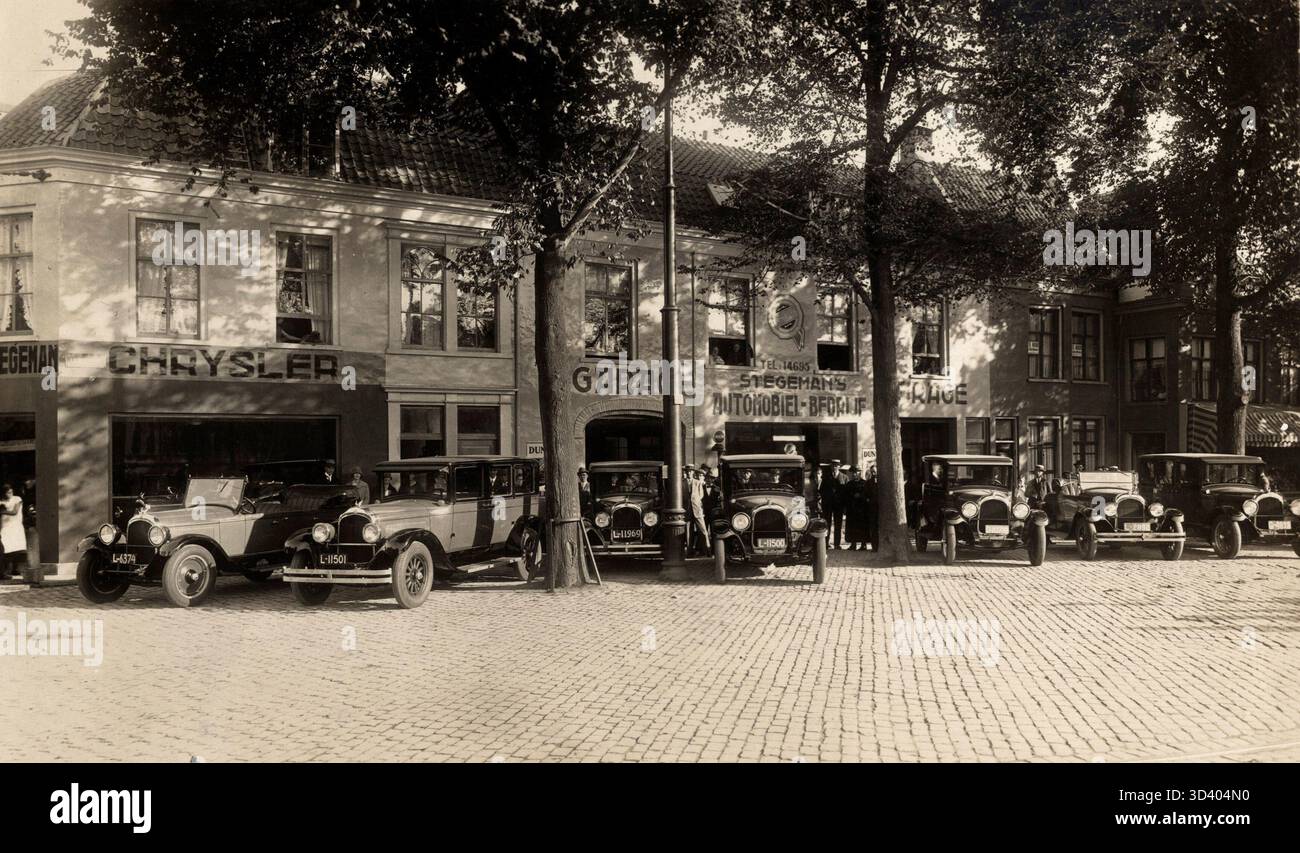 Seven Chrysler cars parked outside Garage Stegeman in Utrecht ...