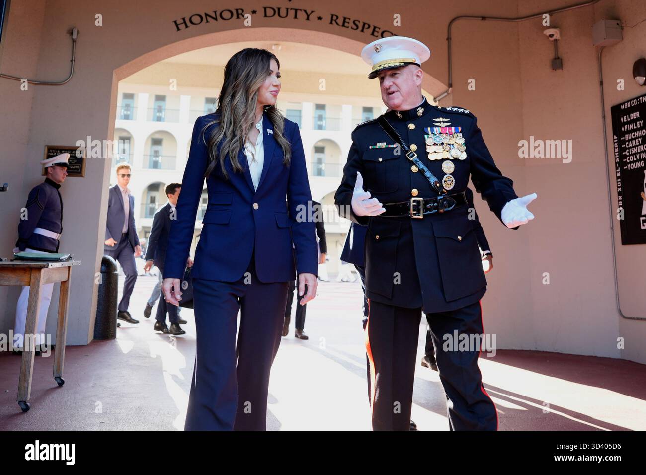 U.S. Homeland Security Secretary Kristi Noem walks with Citadel ...