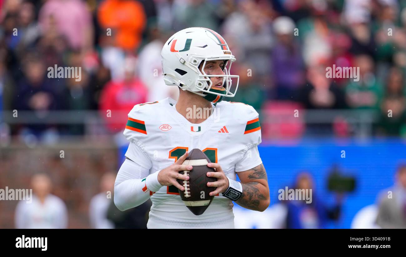 Miami quarterback Carson Beck drops back to pass during an NCAA college ...