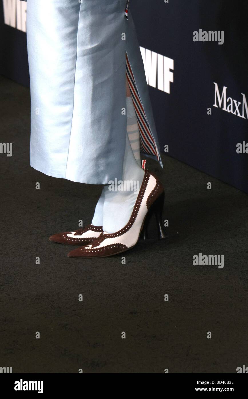 Felicity Jones, shoe detail attends the 2025 WIF Honors Presented By ...