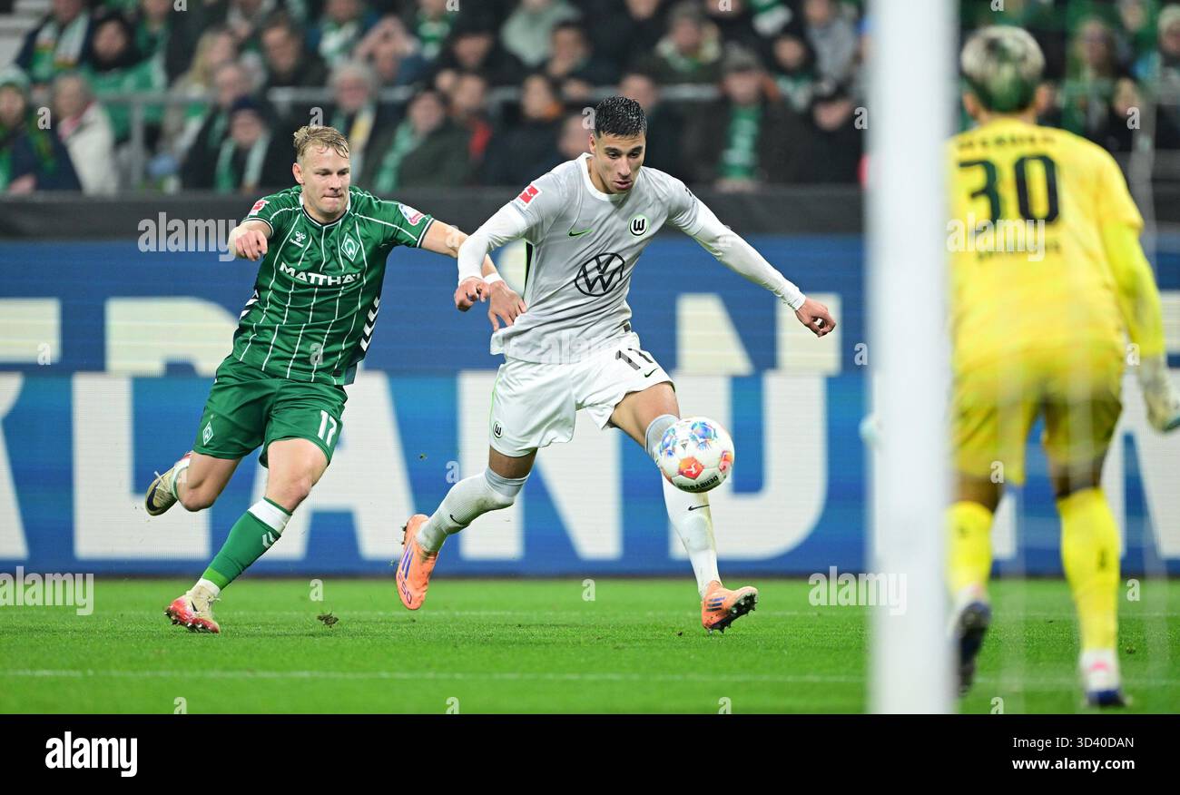 from left: Marco Gruell, Adam Daghim (Wolfsburg), goalkeeper Mio ...