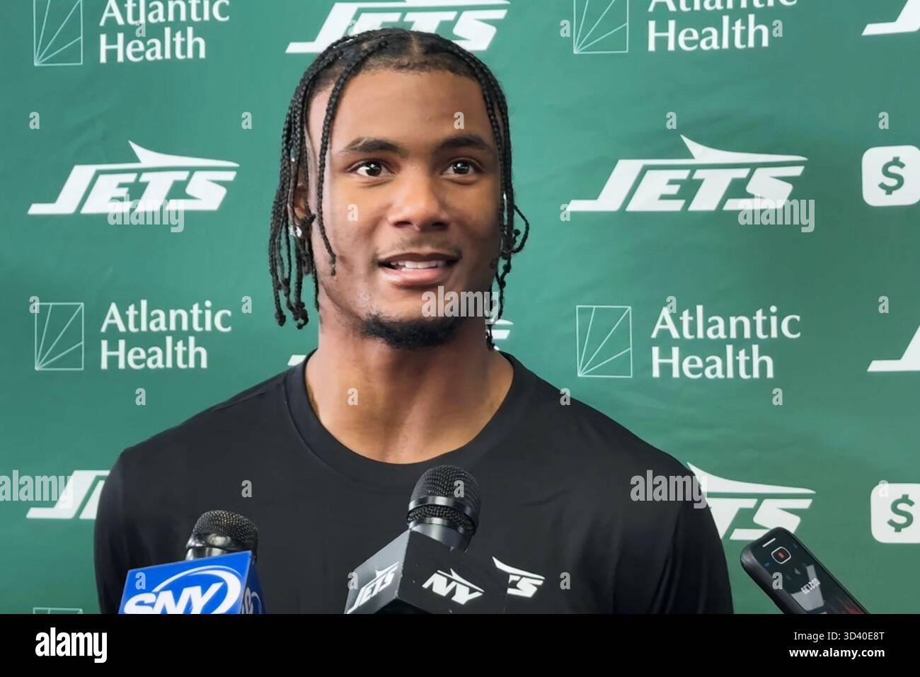 New York Jets wide receiver Adonai Mitchell speaks to reporters at the ...