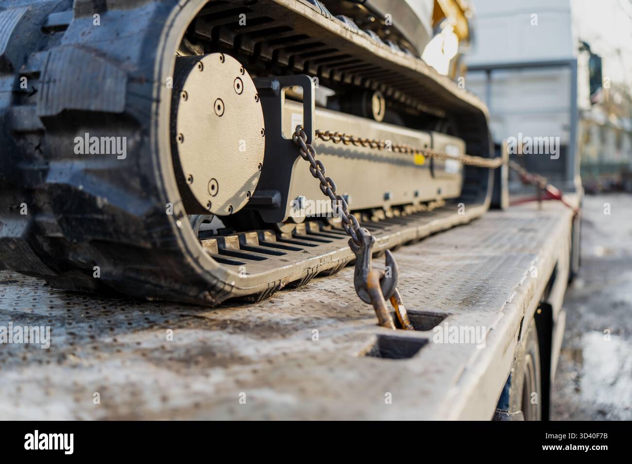 Crawler track of construction equipment fastened with tensioned chain ...