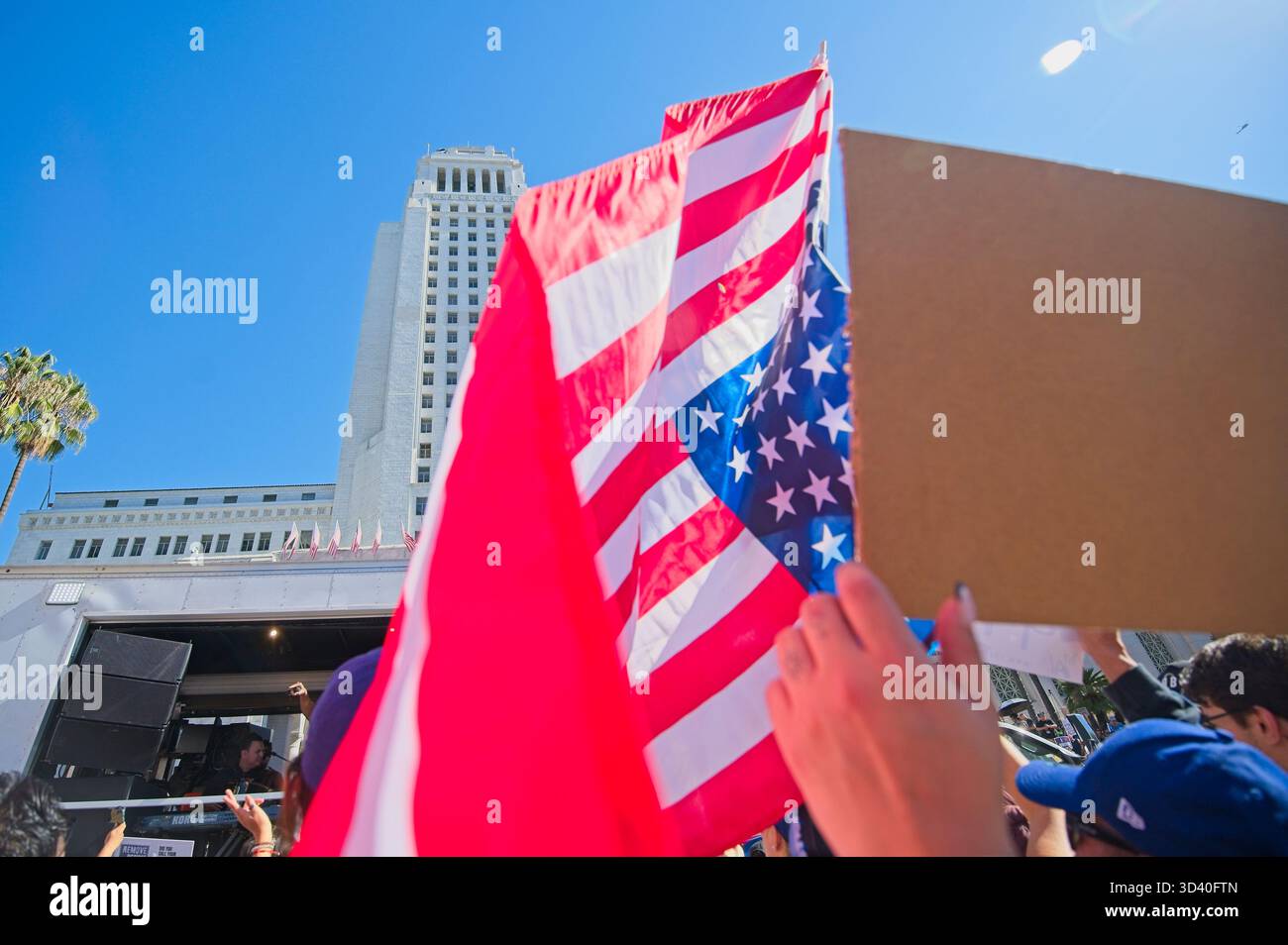 Los Angeles, California, USA, October 18, 2025. Protesters carry flags ...
