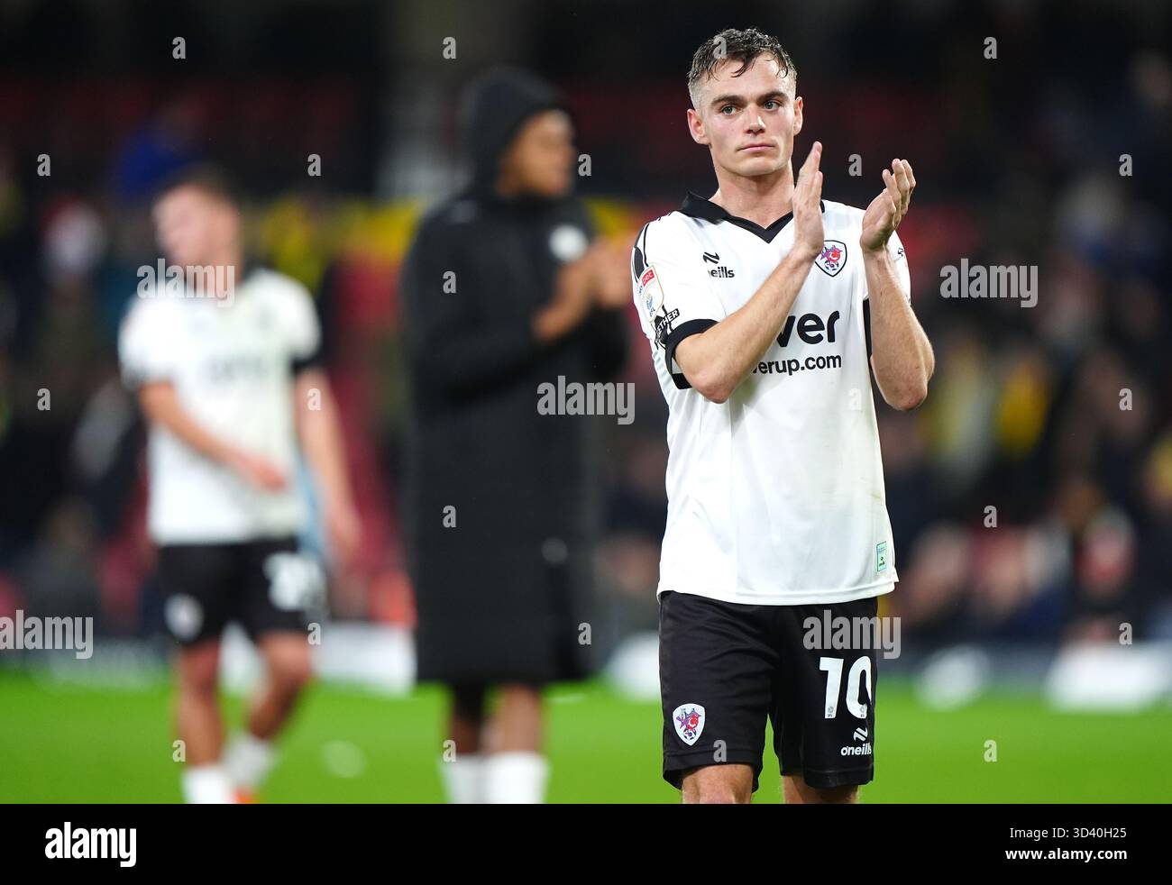 Bristol City's Scott Twine (right) and team-mates applaud the fans ...