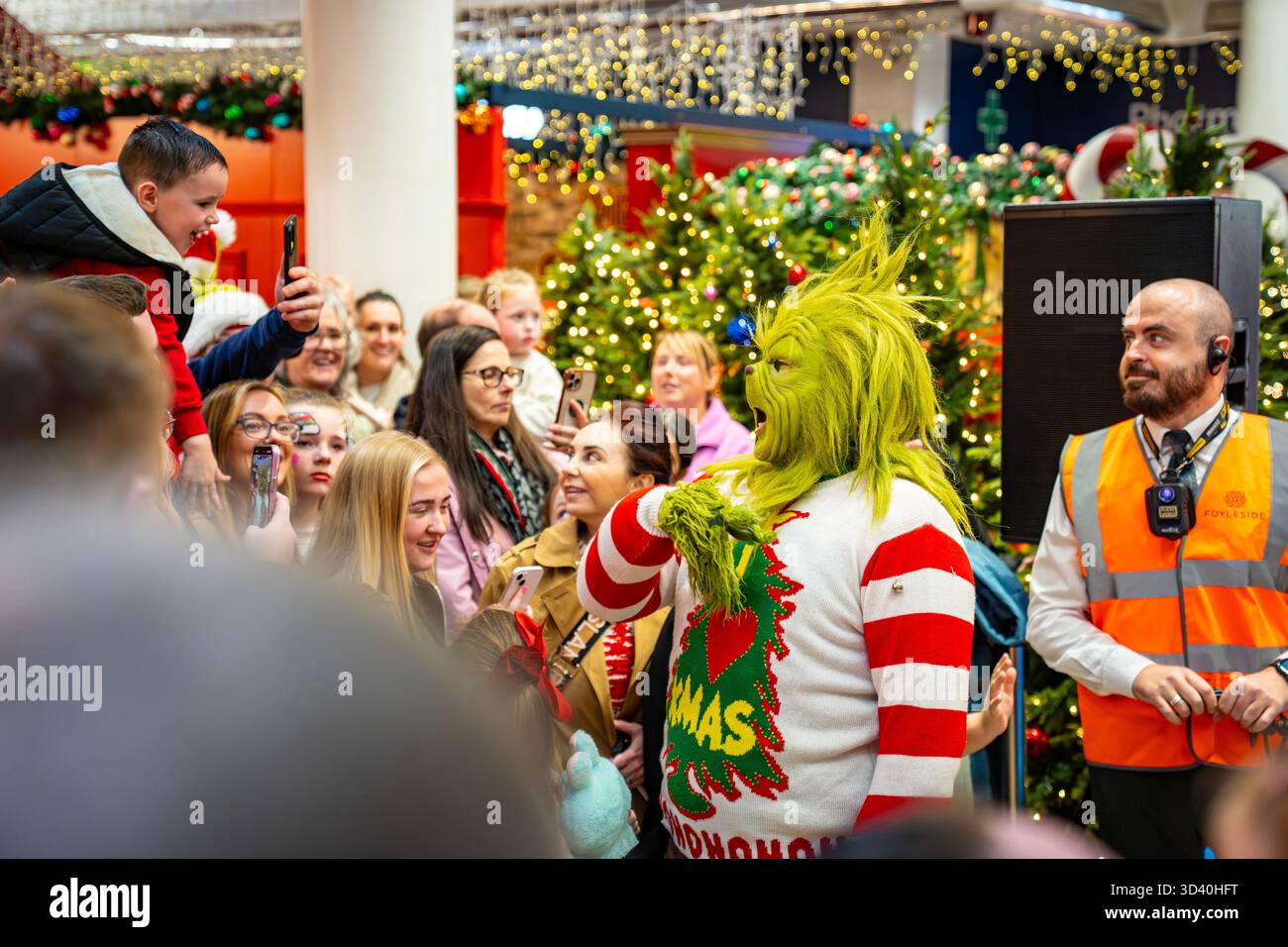 Derry, Northern Ireland. 7 November 2025. Santa and the Grinch share ...