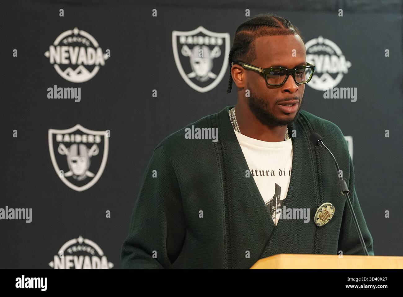 Las Vegas Raiders quarterback Geno Smith talks after an NFL football ...