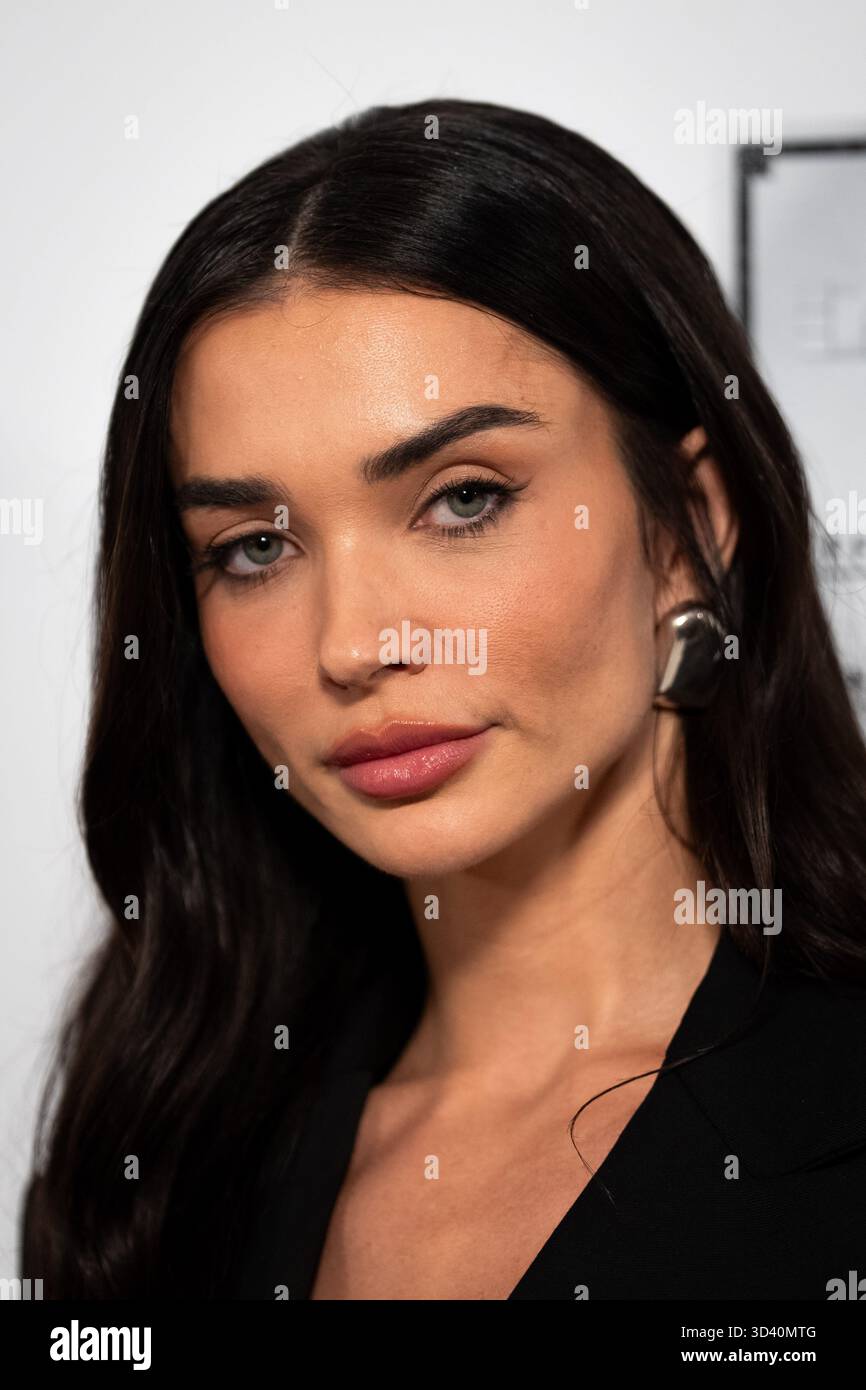 Amy Jackson poses for photographers upon arrival at the Harper's Bazaar ...