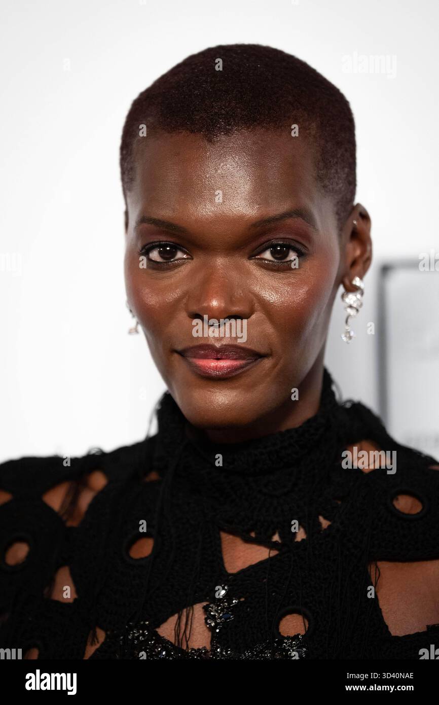 Sheila Atim poses for photographers upon arrival at the Harper's Bazaar ...