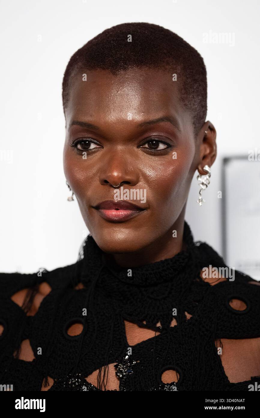 Sheila Atim poses for photographers upon arrival at the Harper's Bazaar ...