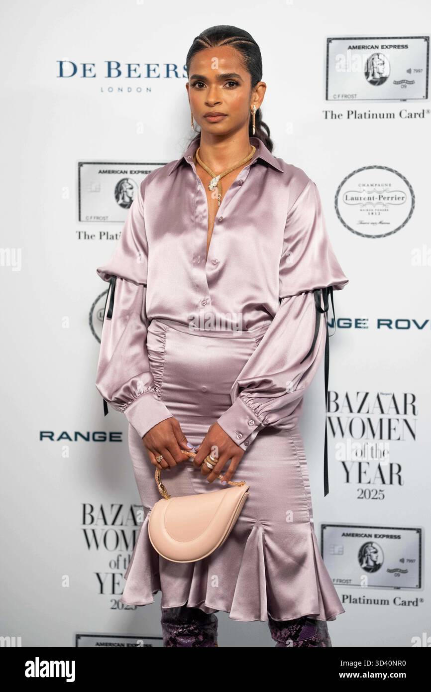 Ramla Ali poses for photographers upon arrival at the Harper's Bazaar ...
