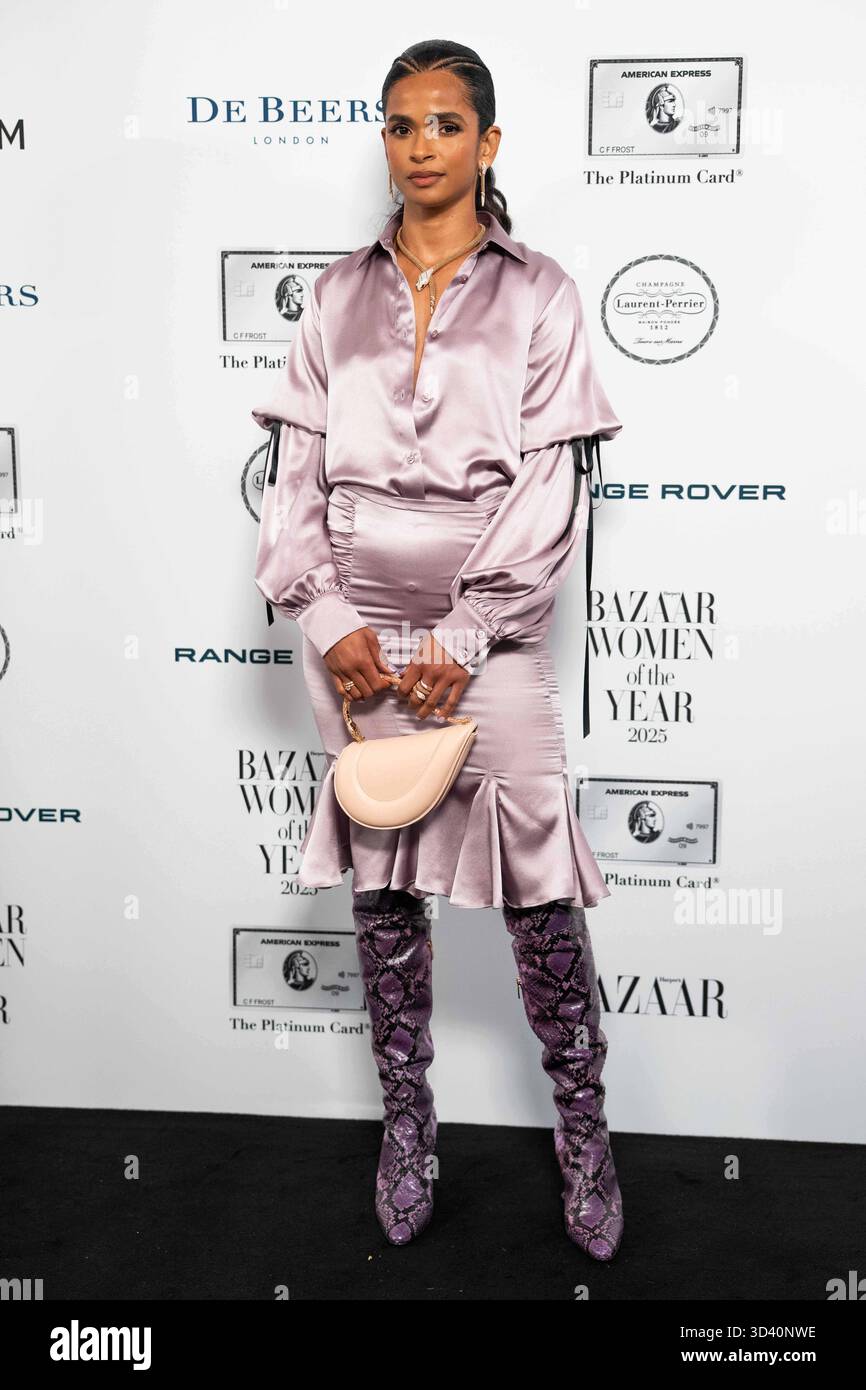 Ramla Ali poses for photographers upon arrival at the Harper's Bazaar ...