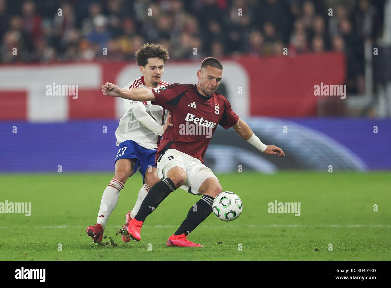 Karol Struski of Rakow Czestochowa (L) and Pavel Kaderabek of Sparta ...