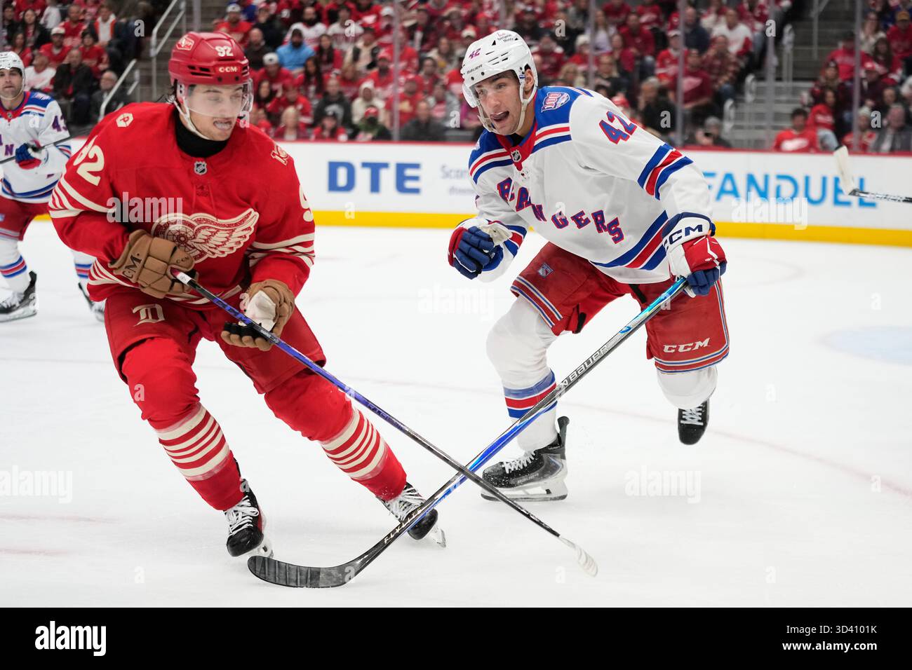 Detroit Red Wings center Marco Kasper, left, and New York Rangers ...