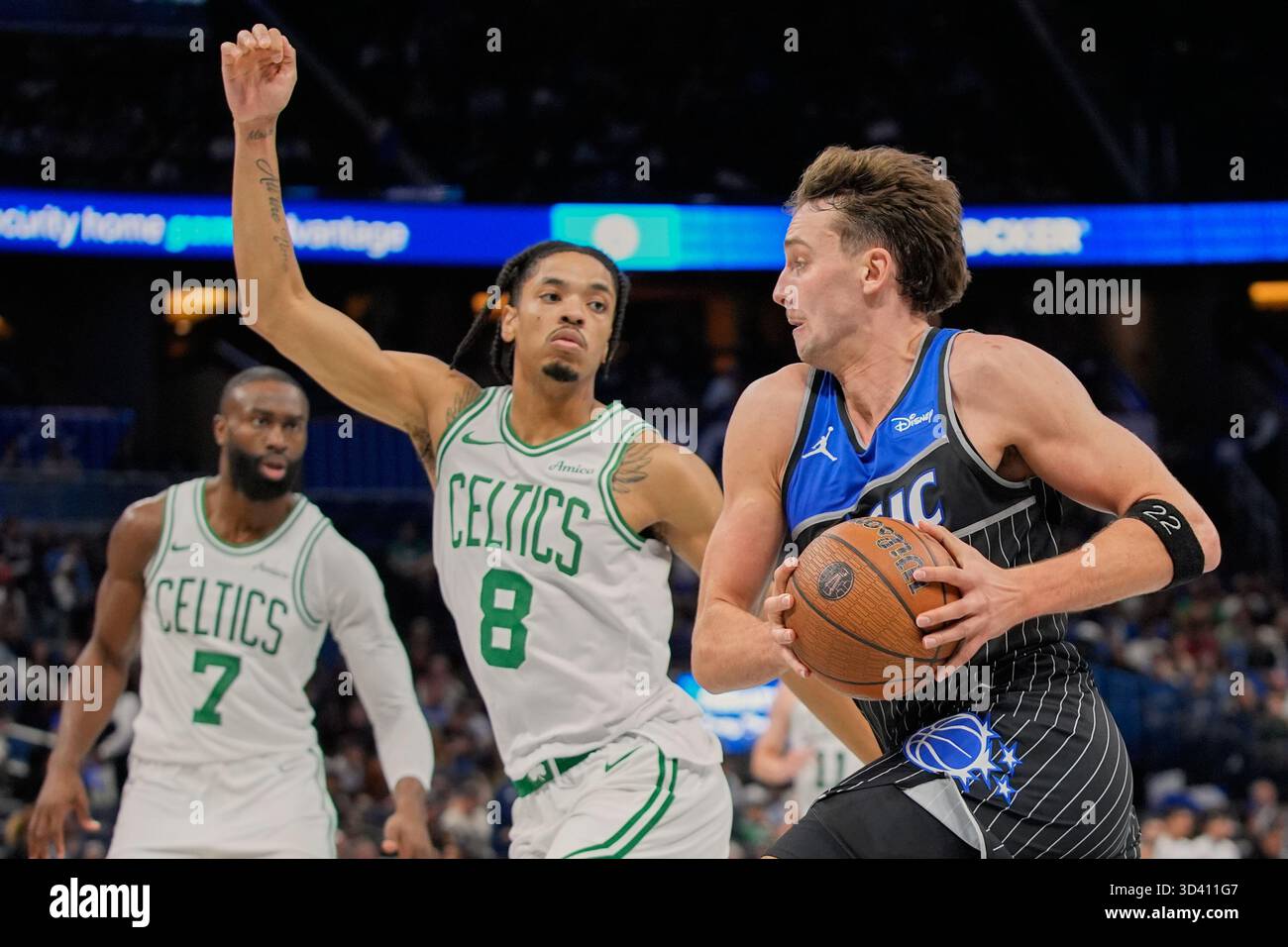 Orlando Magic forward Franz Wagner, right, drives past Boston Celtics ...