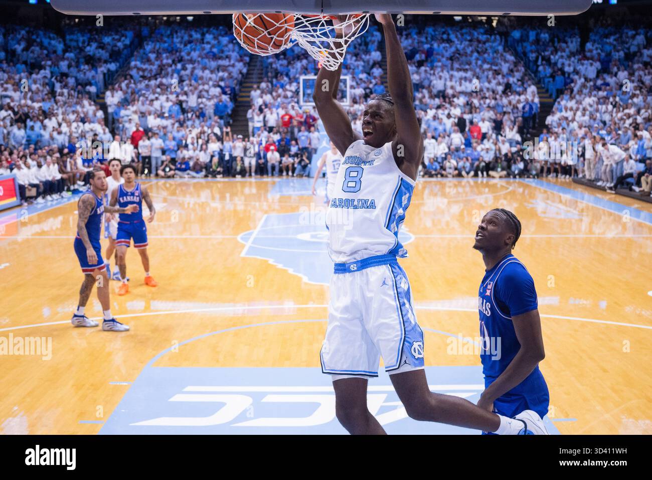 November 7, 2025: North Carolina Tar Heels forward Caleb Wilson (8) dunks against the Kansas ...