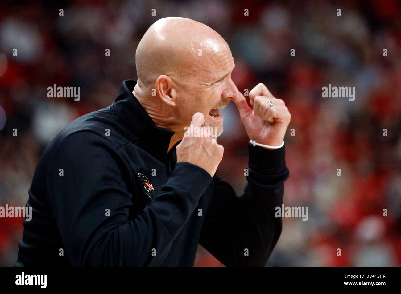 UAB head coach Andy Kennedy instructs his team against North Carolina ...