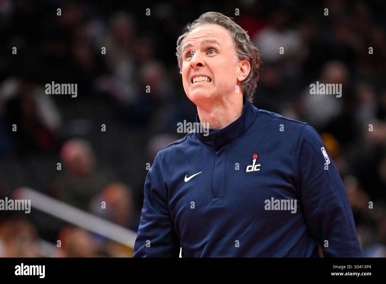 Washington Wizards head coach Brian Keefe checks the scoreboard during ...