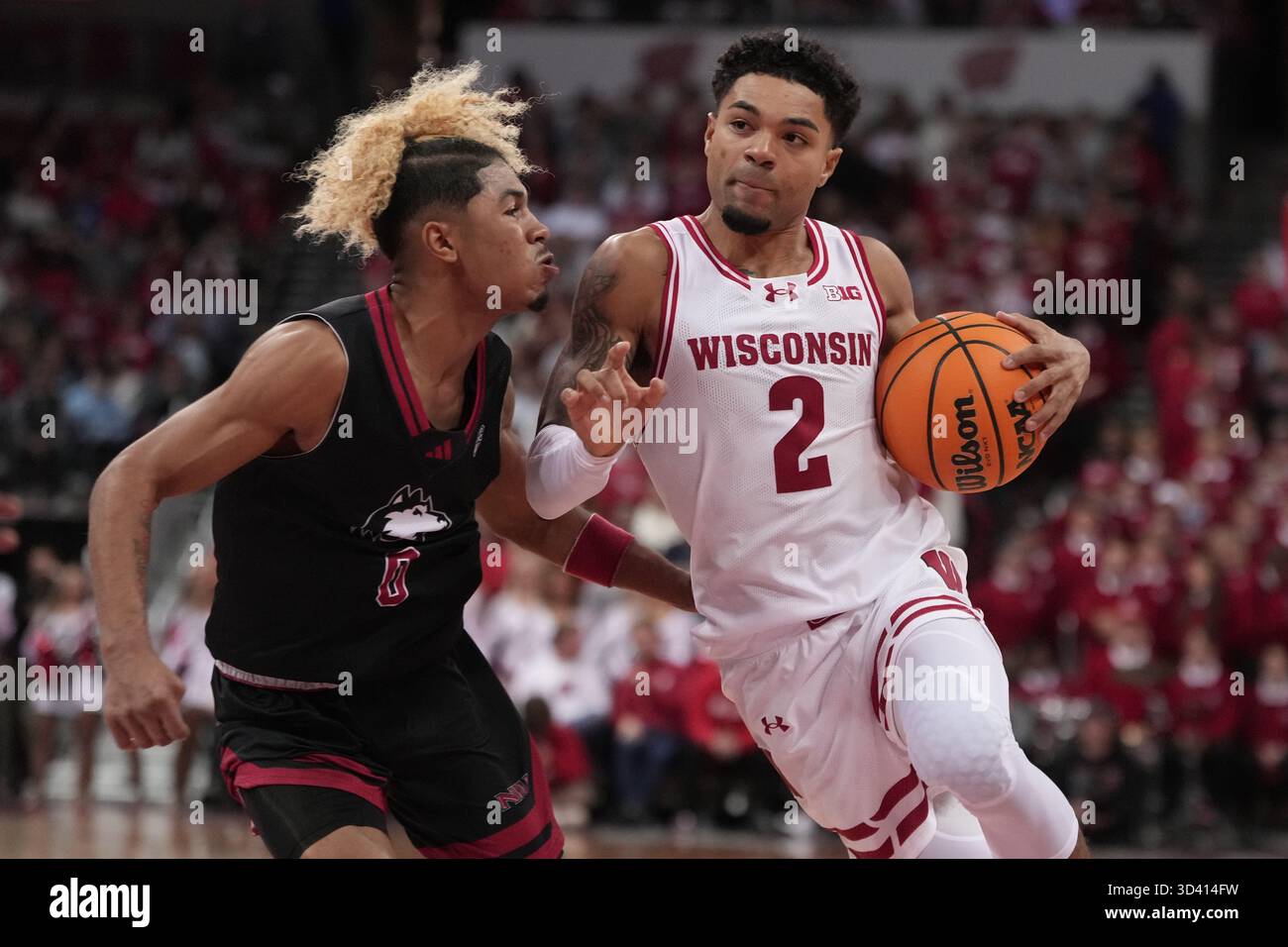 Wisconsin's Nick Boyd gets past Northern Illinois' Gianni Cobb during ...