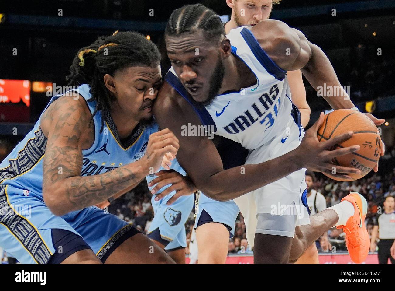 Dallas Mavericks center Moussa Cisse (30) collides with Memphis ...