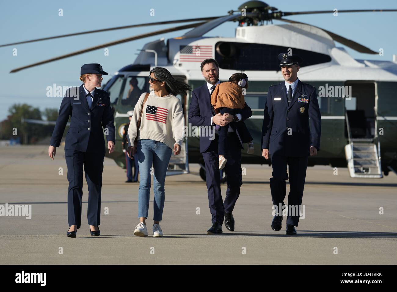 FILE - Vice President JD Vance and second lady Usha Vance walk toward Air Force Two at Joint ...