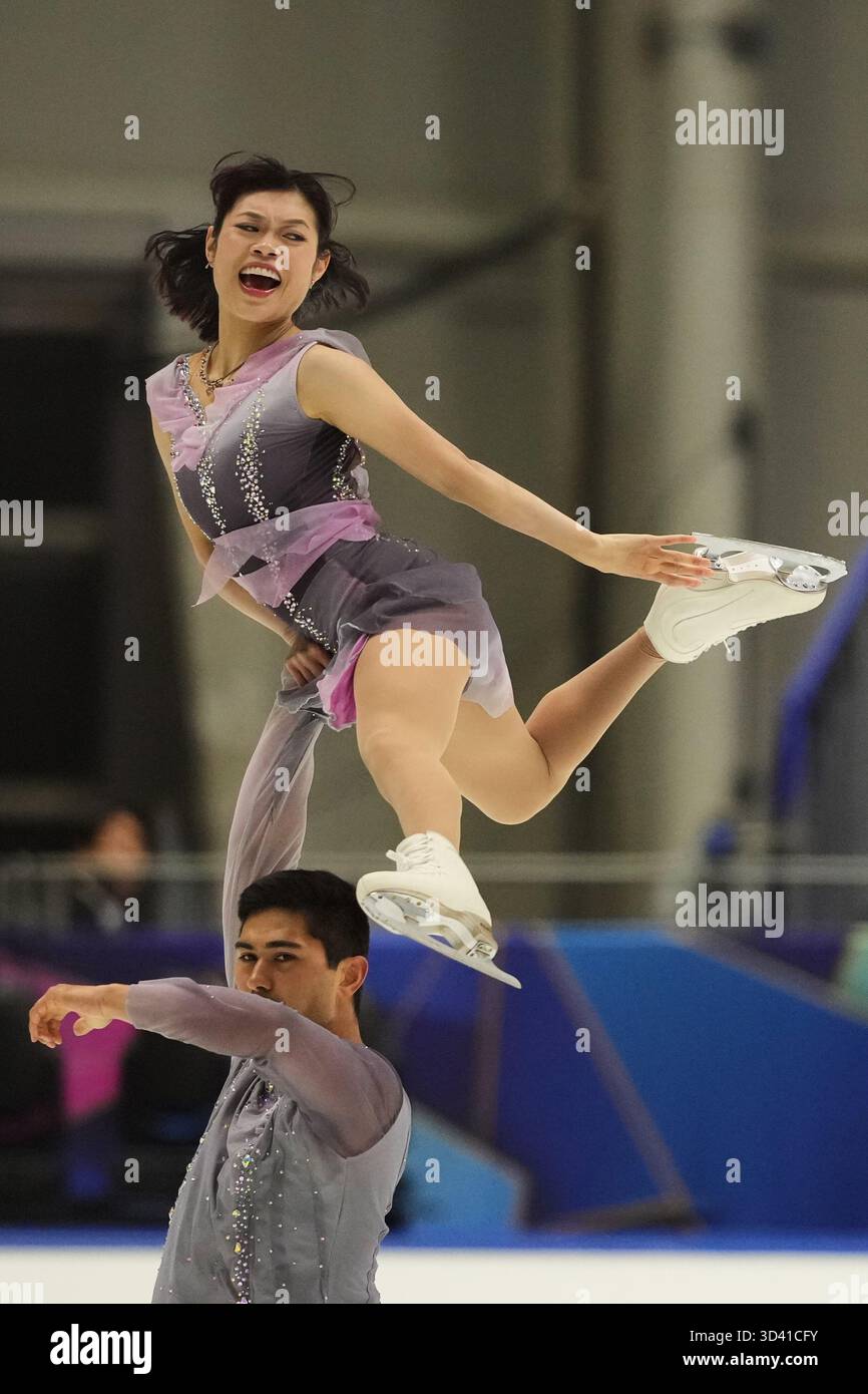 Emily Chan and Spencer Akira Howe, of the U.S., perform during the ...