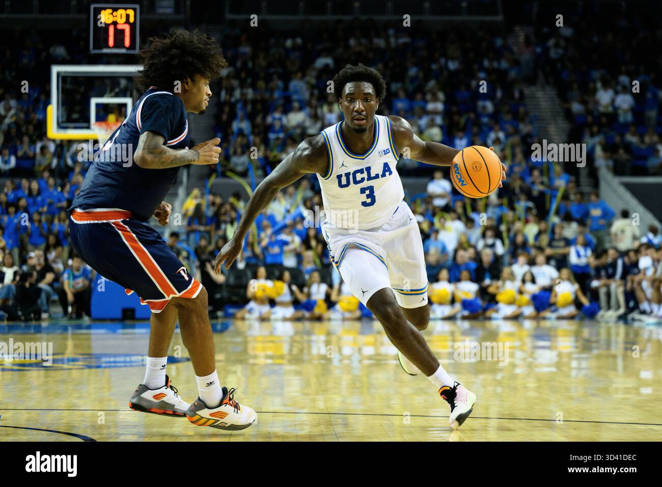 UCLA forward Eric Dailey Jr. (3) drives the ball past Pepperdine guard ...