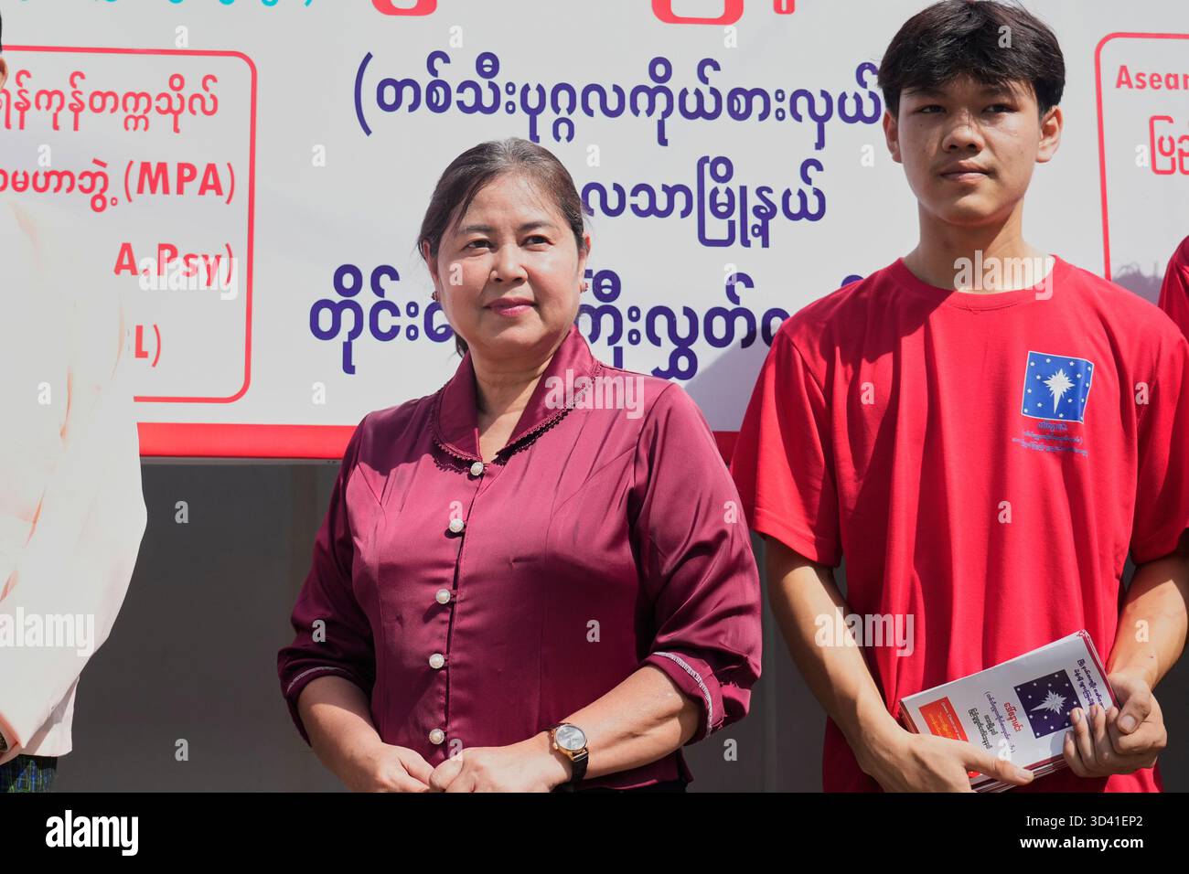 Sandar Min, left, an individual candidate for upcoming election and ...