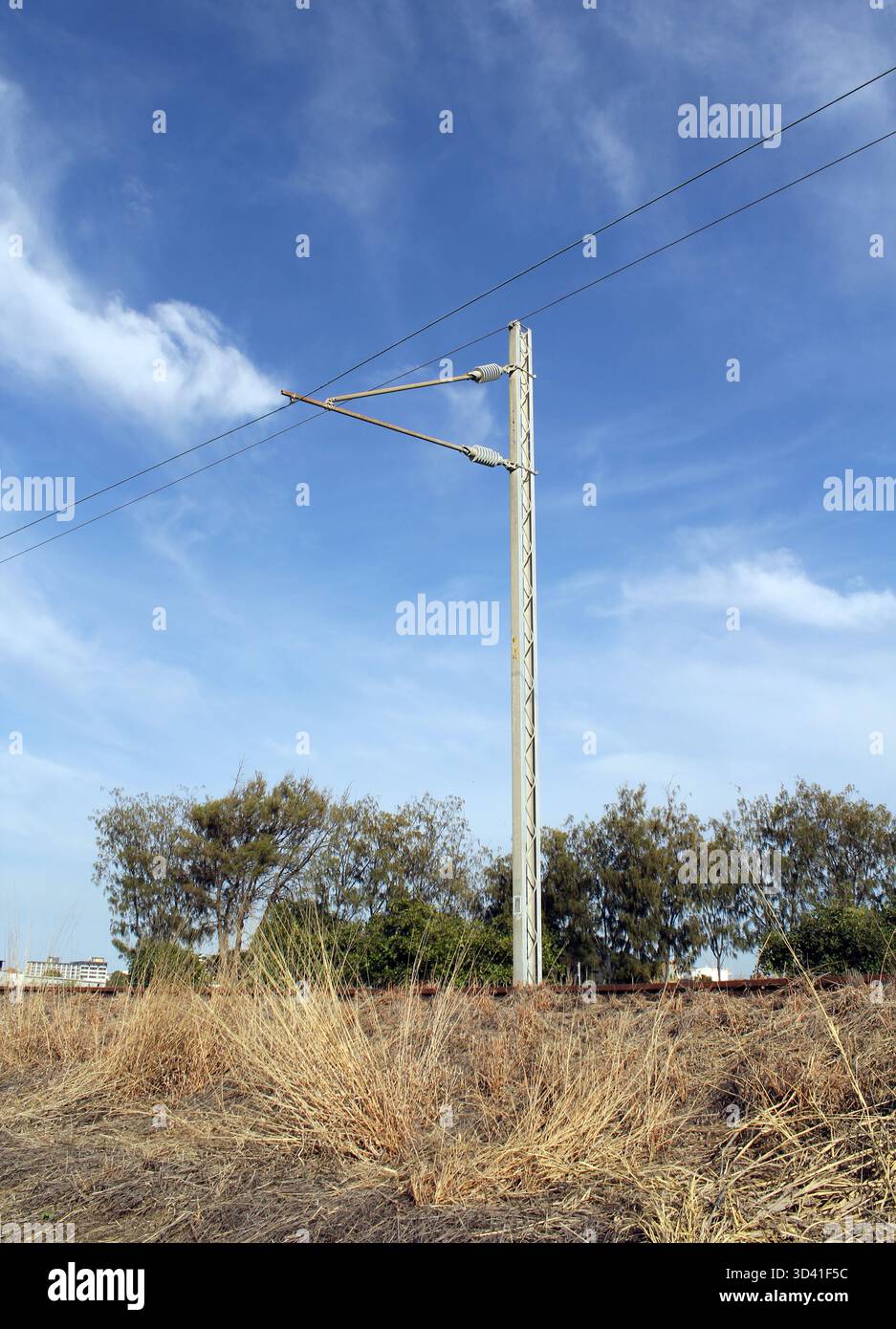 Tall pole and overhead power lines used by electric trains in Australia ...
