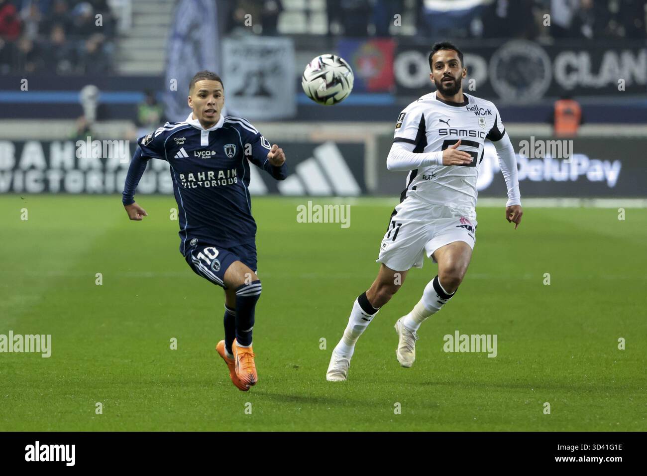 Ilan Kebbal of Paris FC, Mousa Tamari aka Musa Al-Taamari of Rennes ...