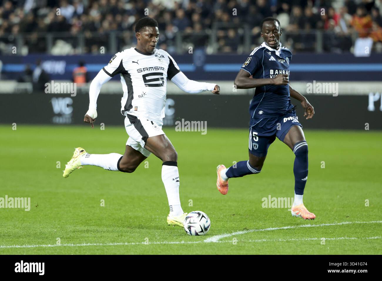 Breel Embolo of Rennes, Moustapha Mbow of Paris FC during the French ...